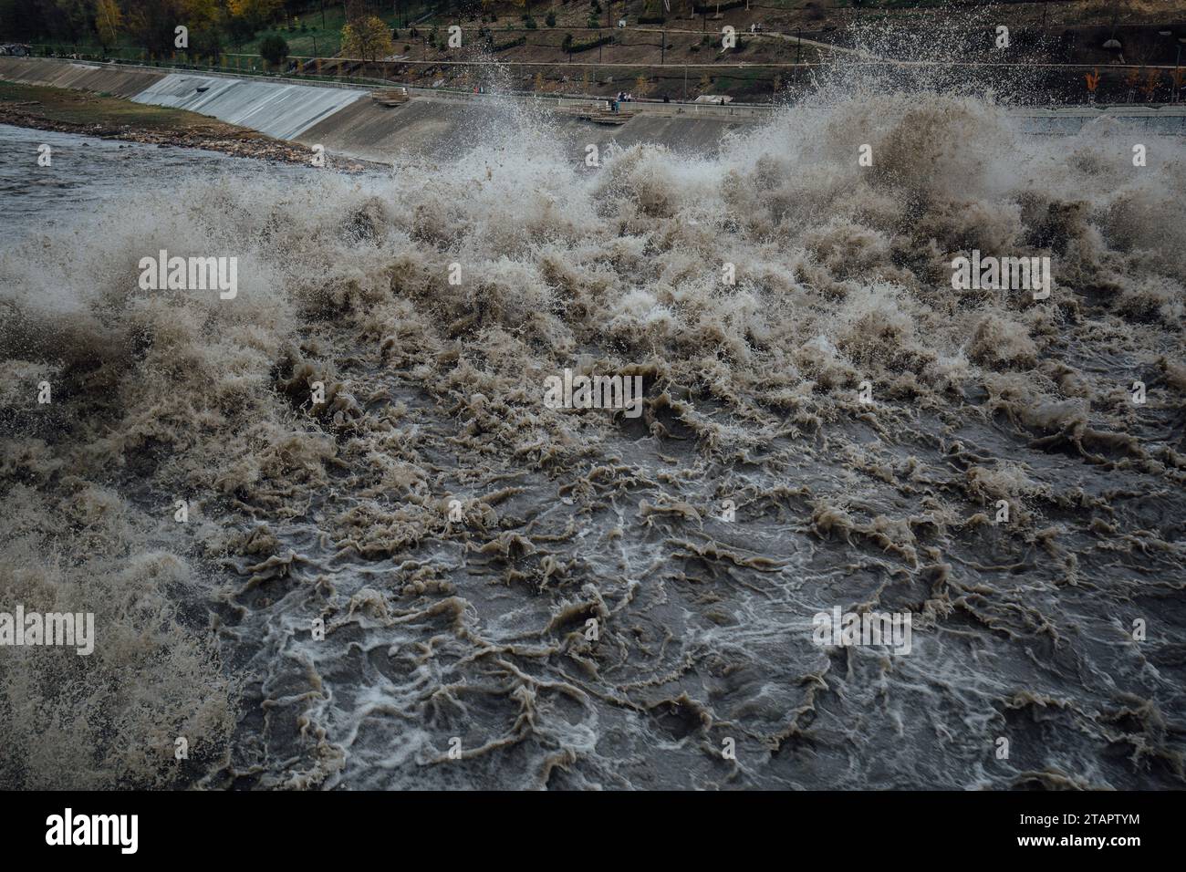 Spillway in Maykop dam, dirty water in river Stock Photo - Alamy