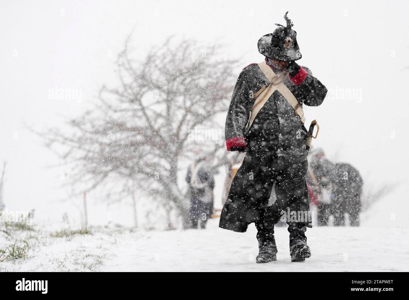 History enthusiast dressed in regimental costume shields himself from ...