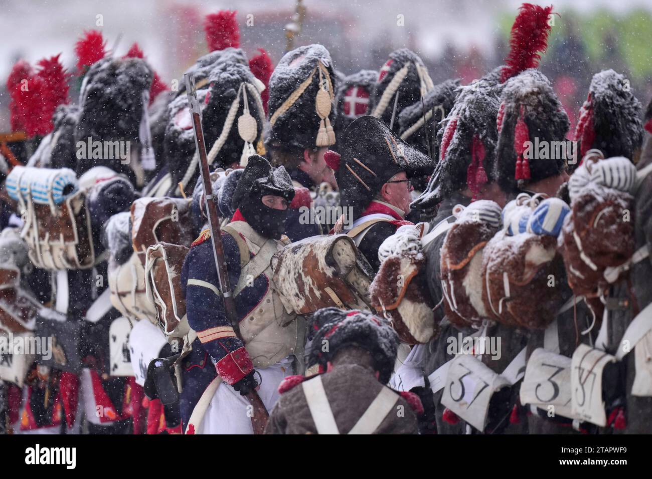 History enthusiasts dressed in regimental costumes take part in a re ...