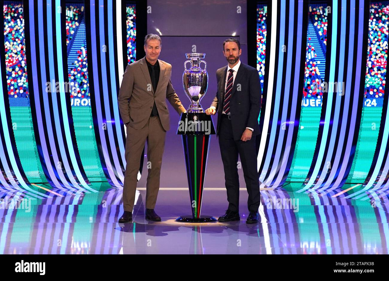 England head coach Gareth Southgate (right) and Denmark head coach ...