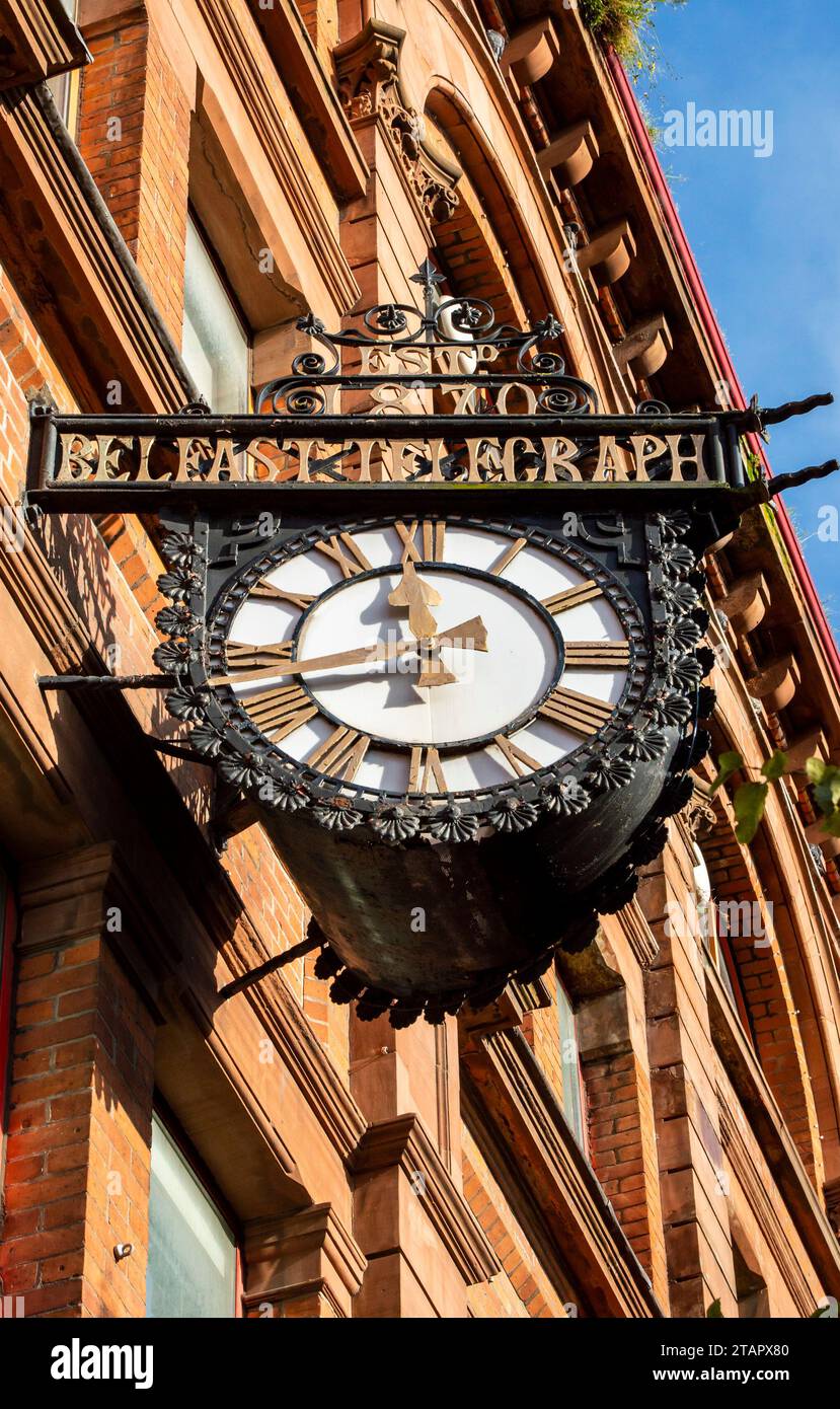 Belfast, UK, Sep 29, 2023. Upwards view of a big clock with logo of ...