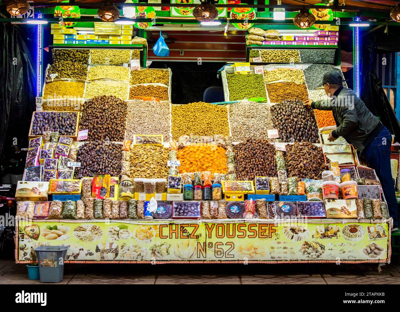 Marrakech, Morocco, April 8th, 2023. A Moroccan male vendor preparing ...