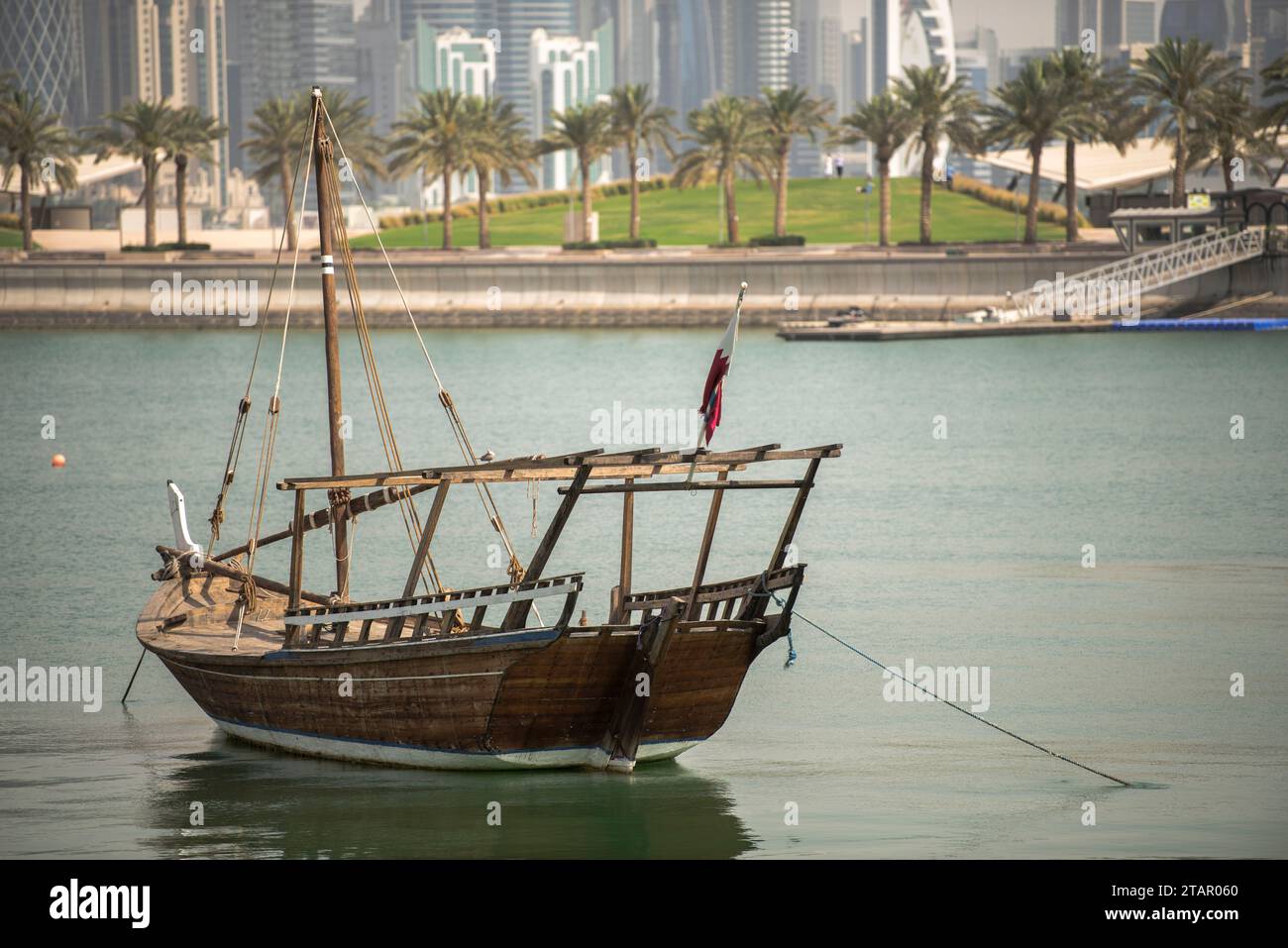 Doha ,Qatar - April 24,2022 Traditional boats called Dhows are anchored ...