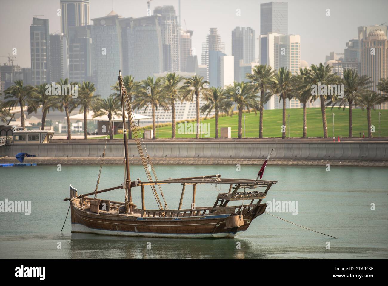 Doha ,Qatar - April 24,2022 Traditional boats called Dhows are anchored ...