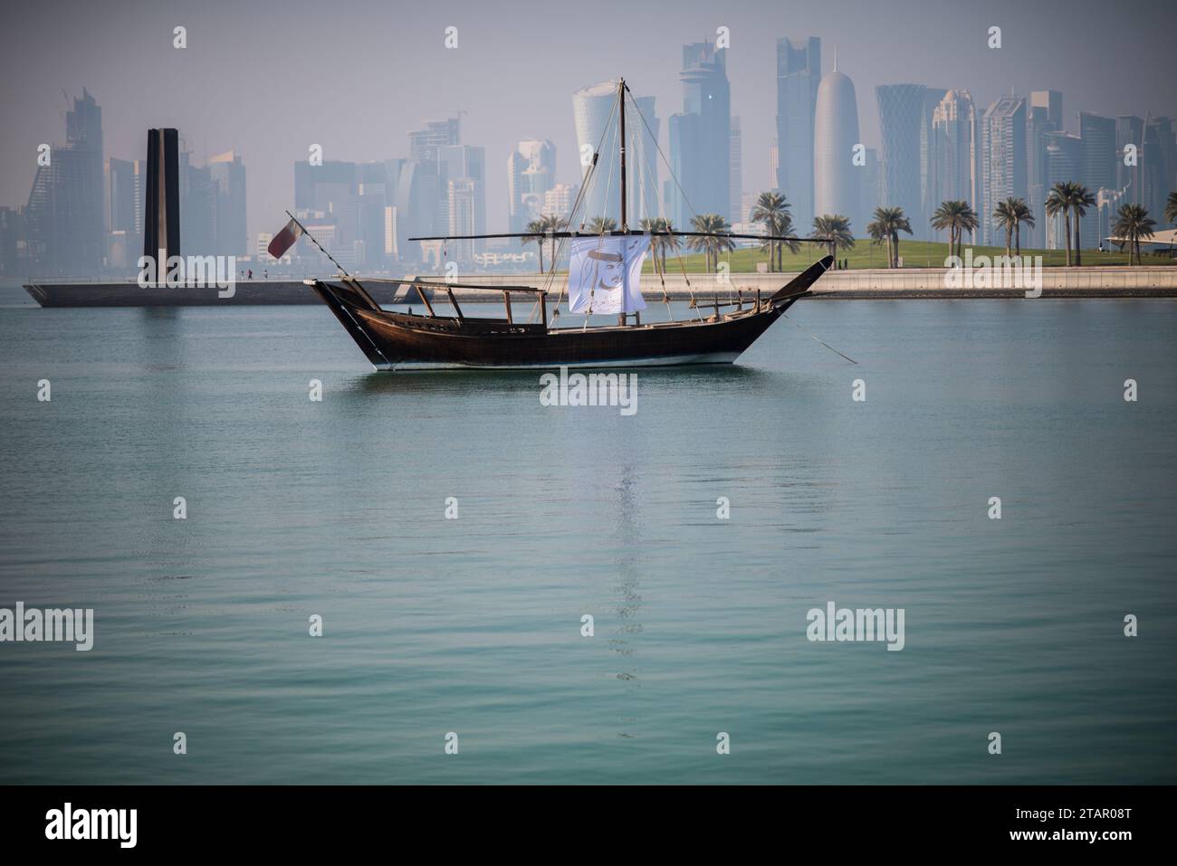 Doha ,Qatar - April 24,2022 Traditional boats called Dhows are anchored ...