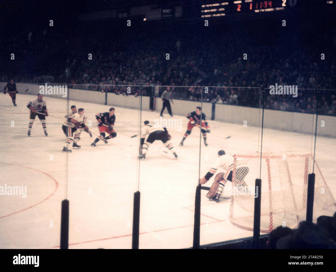 NEW YORK, NY - 1958: Danny Lewicki #22 of the New York Rangers skates ...