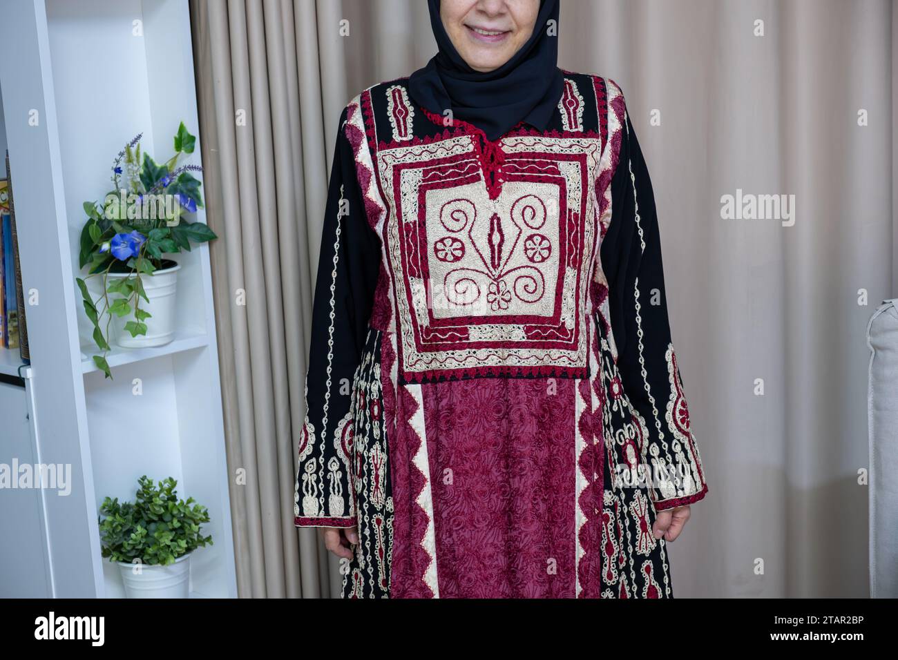 Female wearing palestinian traditional clothes indoor Stock Photo - Alamy
