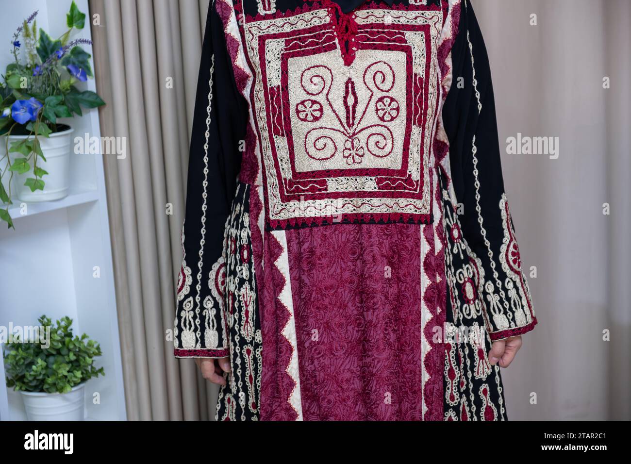 Female wearing palestinian traditional clothes indoor Stock Photo - Alamy