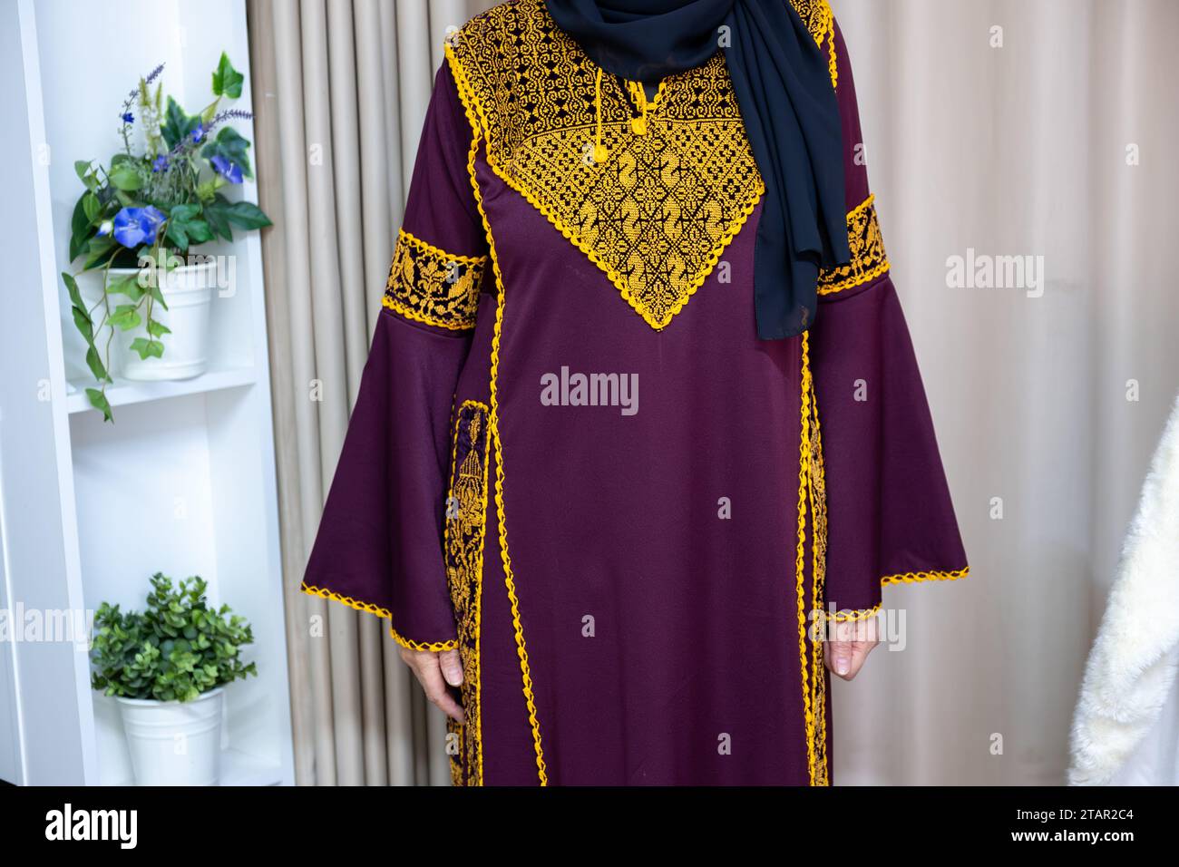 Female wearing palestinian traditional clothes indoor Stock Photo - Alamy