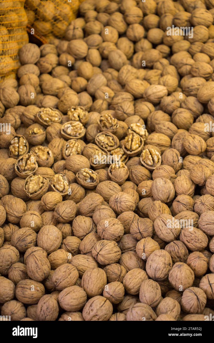 Pile of whole fresh walnuts with hard nutshells Stock Photo - Alamy