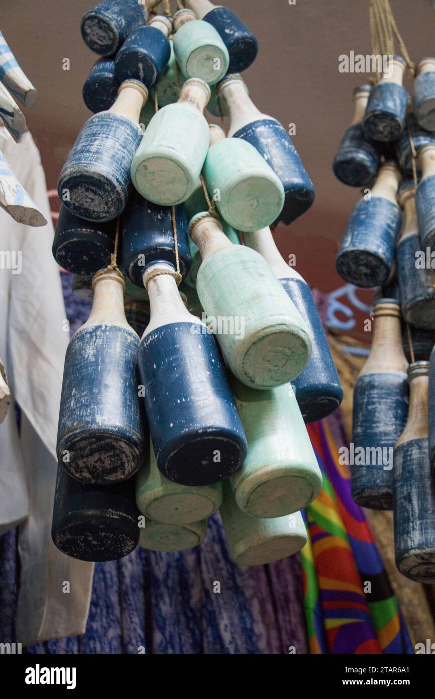 Set of little colorful wooden model bottles for decorative purposes ...