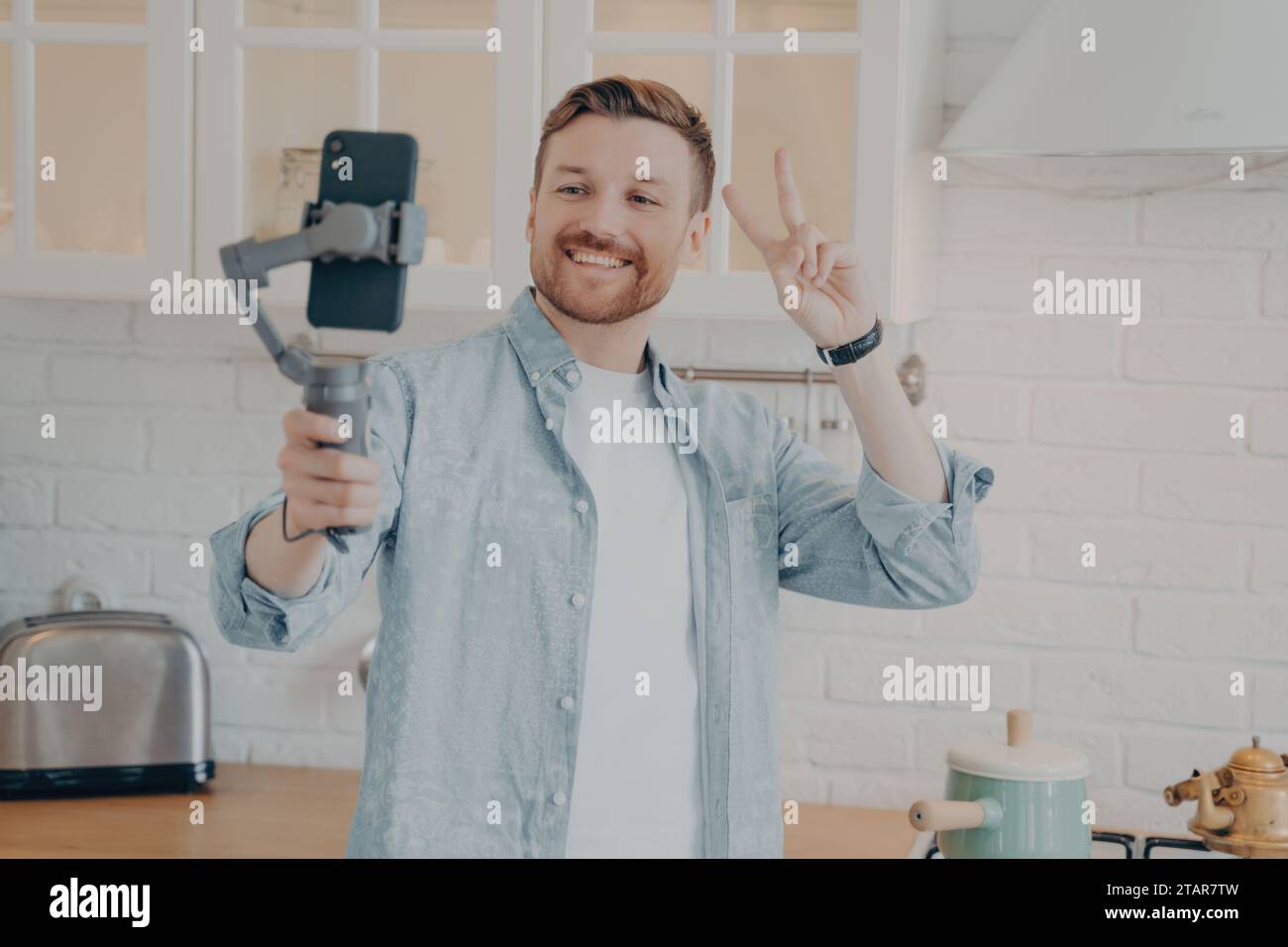 Man making peace sign hi-res stock photography and images - Alamy