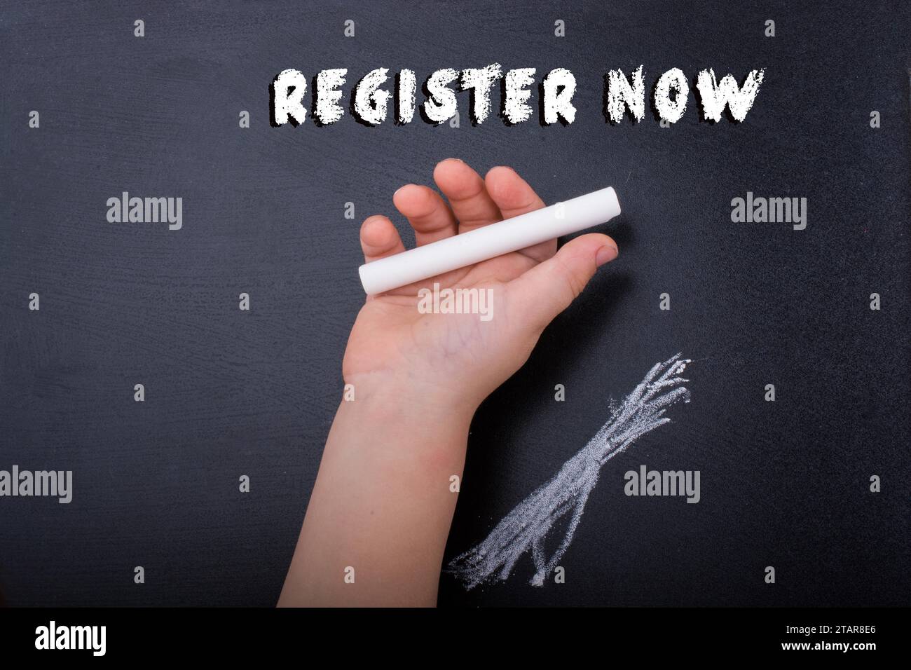 Hand holding white chalk and black board Stock Photo - Alamy