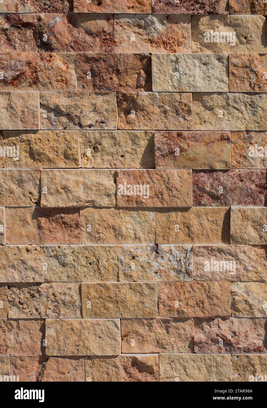 Decorative cubic stone wall as background texture Stock Photo - Alamy