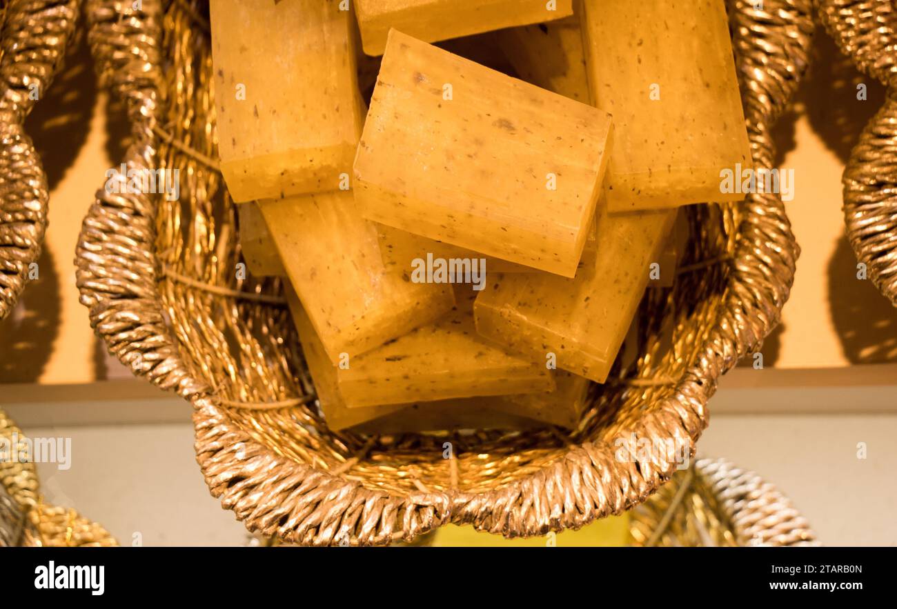 Collection of bars of fragrant hand made organic soap in a basket Stock ...