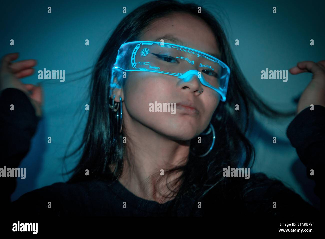 Studio photo with blue background with neon lights of a cool chinese ...