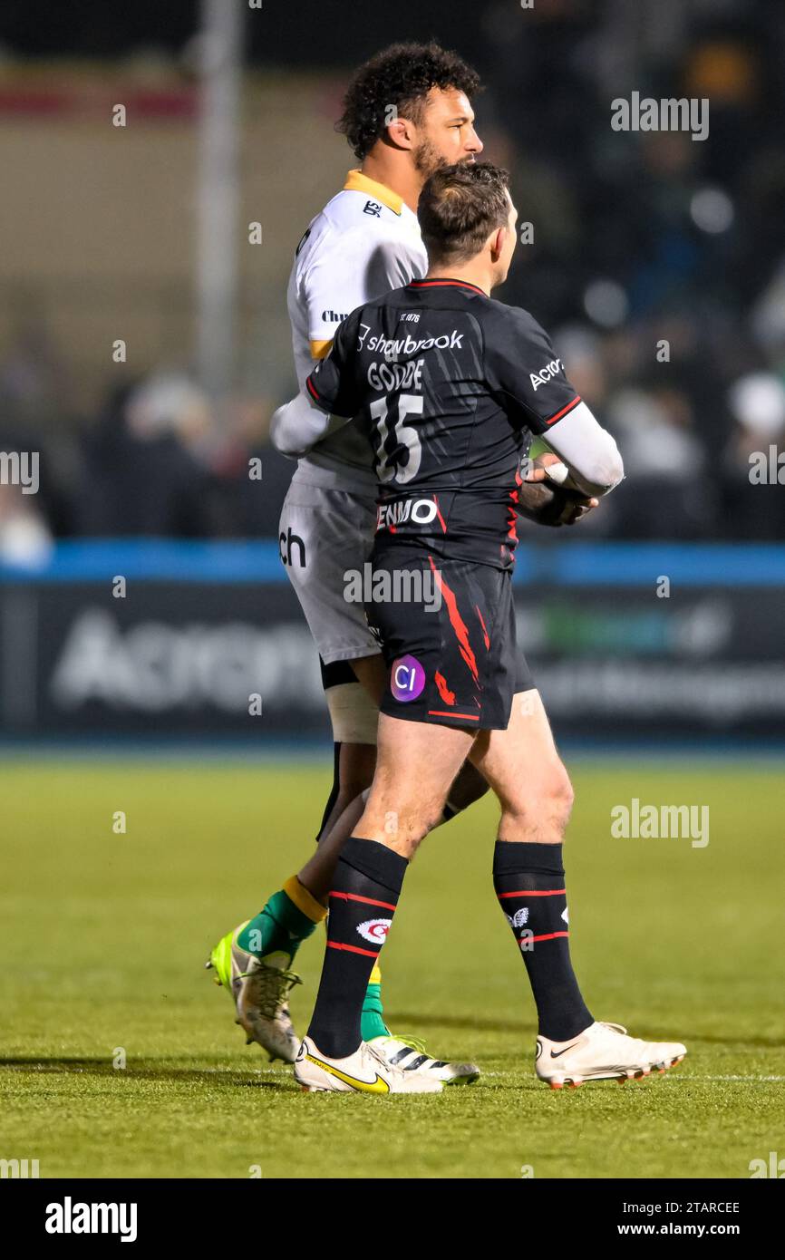 Courtney Lawes of Northampton Saints and Alex Goode of Saracens after ...