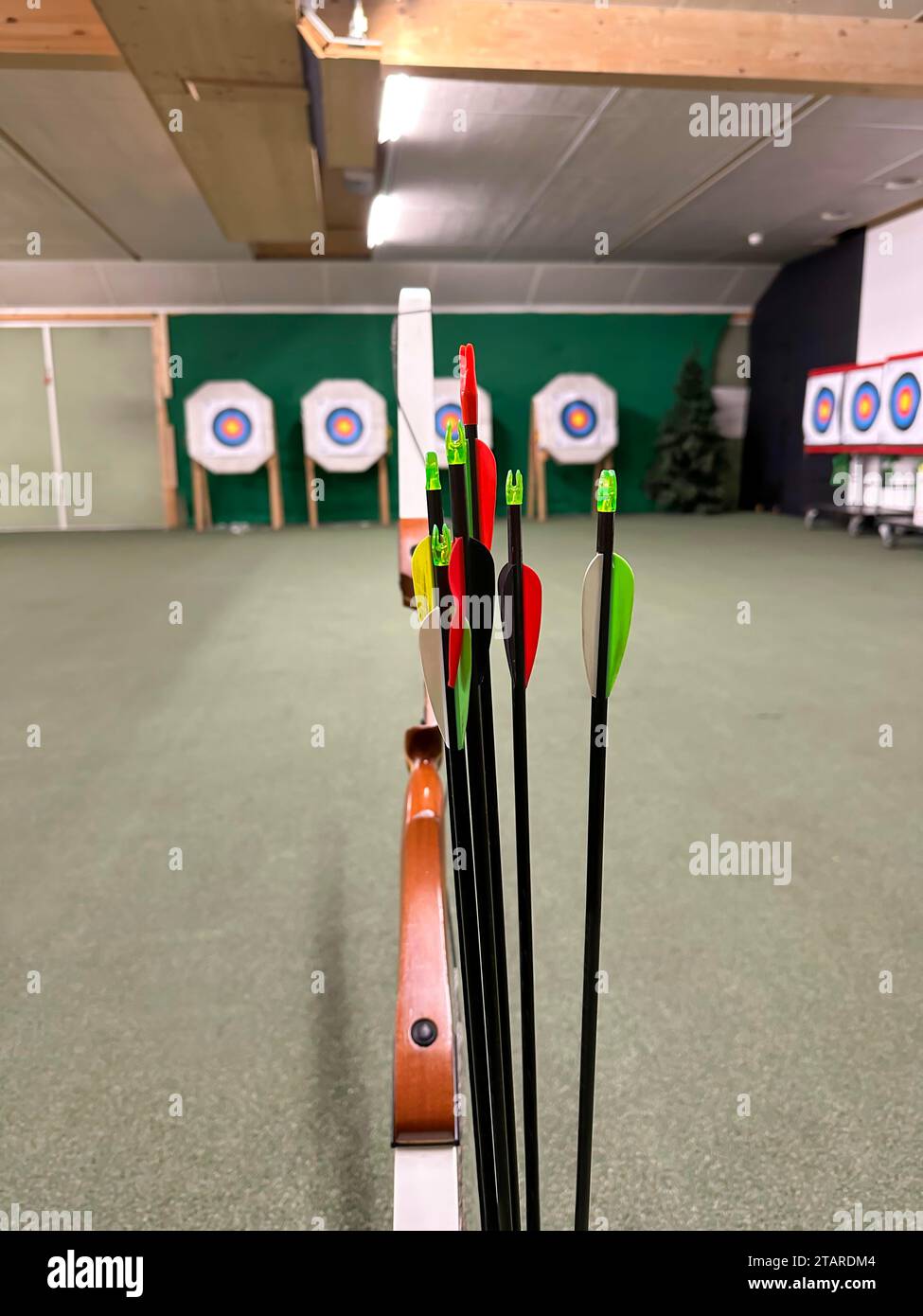 Modern Shooting Range For Archery with Arch and Arrow in an Illuminated ...