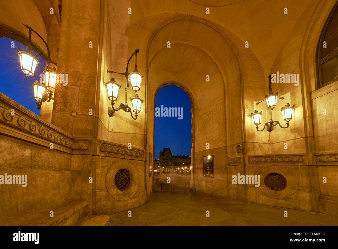 Illuminated Louvre palace galleries at night Stock Photo - Alamy