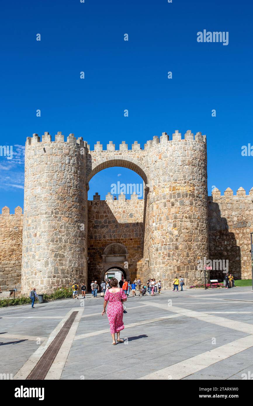 Woman walking towards the ramparts and fortifications in the Spanish ...