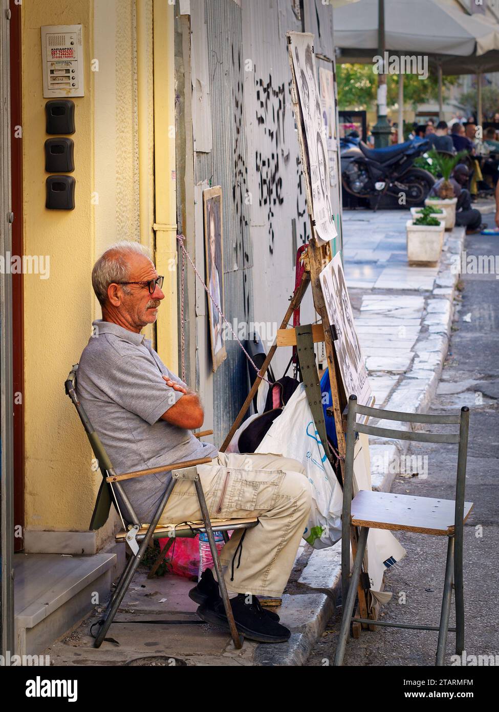 Street painter artist selling personal artwork Stock Photo - Alamy