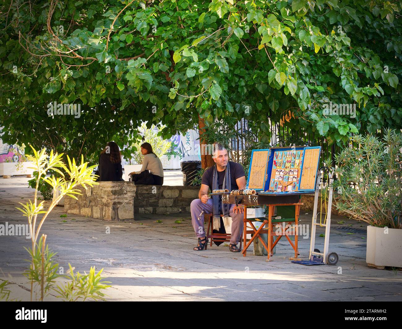 Street artist selling personal artwork Stock Photo - Alamy