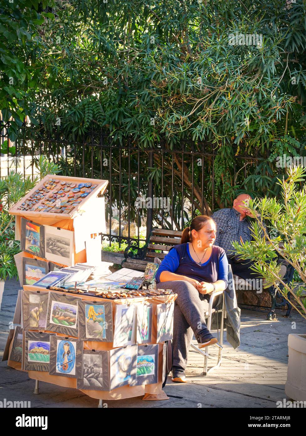 Street artist selling personal artwork Stock Photo - Alamy