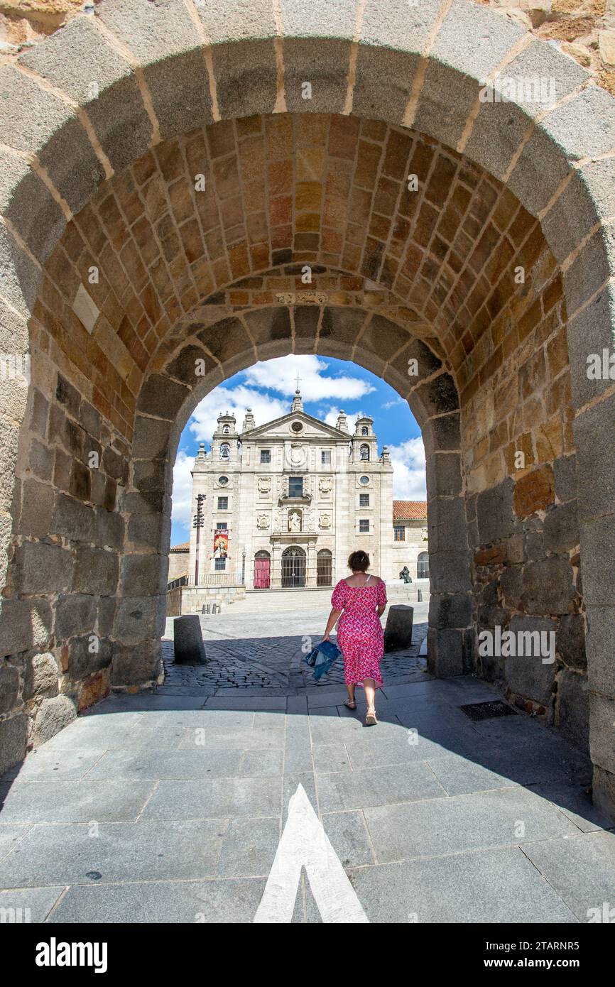 Woman walking through one of the city gates into the ancient walled ...