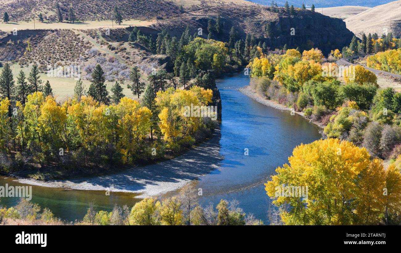 Yakima River winds through yellow trees and basalt cliffs in Kittitas ...