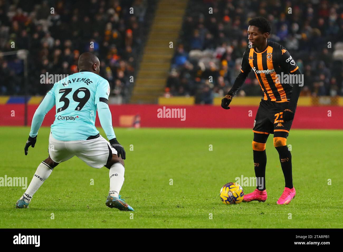 Jaden Philogene of Hull City looks to get past Edo Kayembe of Watford ...