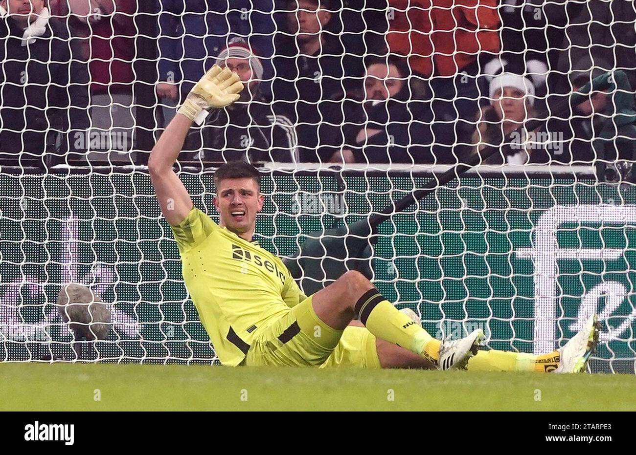 Newcastle United goalkeeper Nick Pope signals to the bench after ...