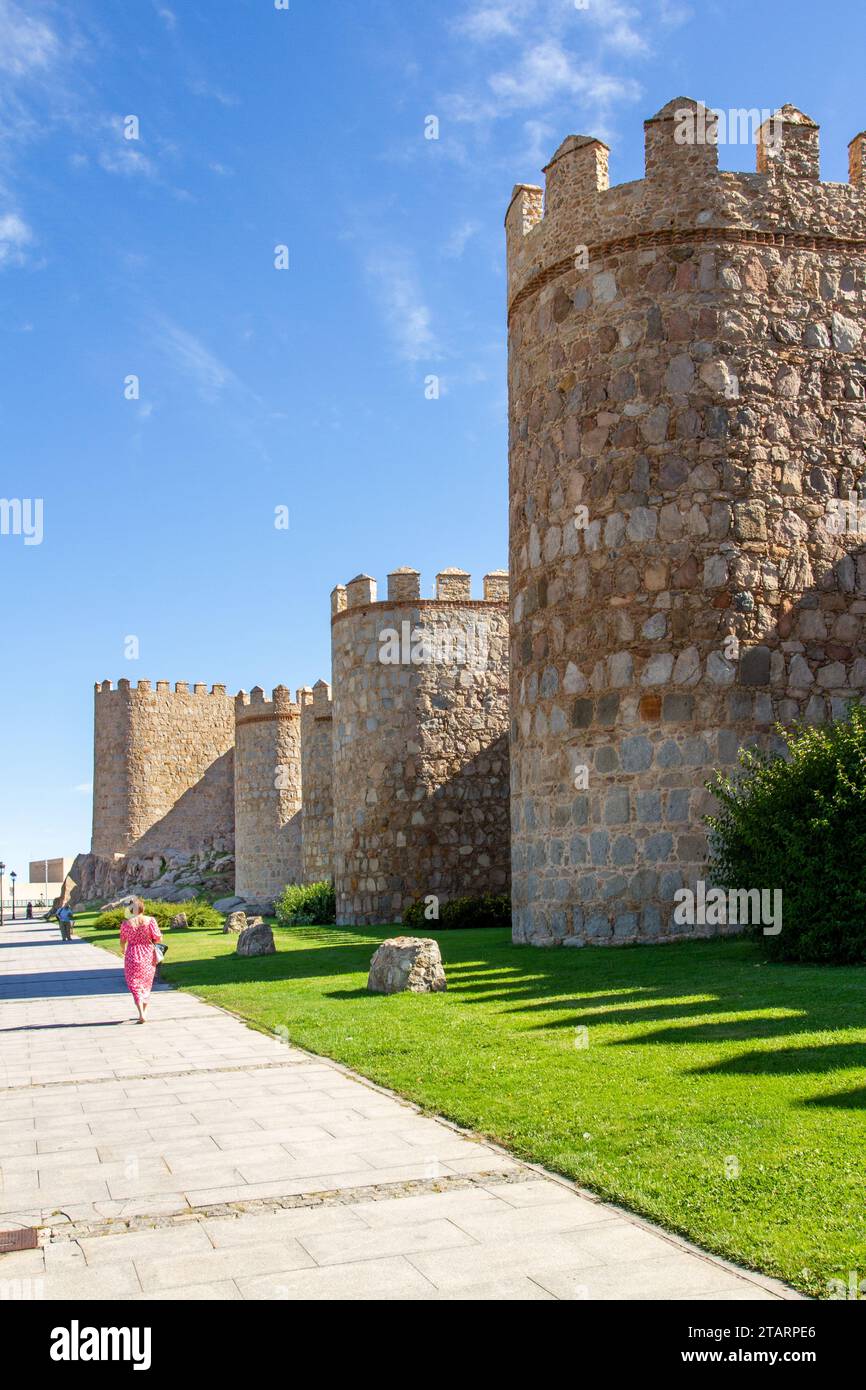 walking along the ramparts of the fortified city walls in the Spanish ...