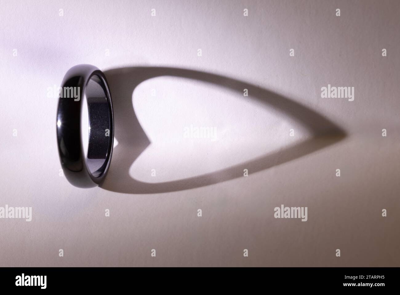 abstract shadow from a circular ring representing love and affection ...
