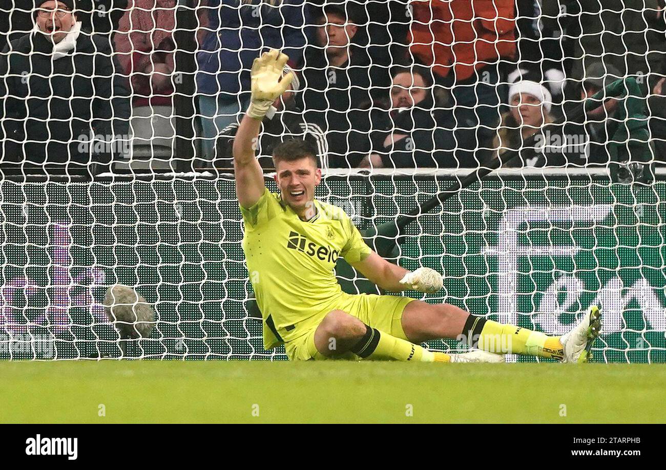 Newcastle United goalkeeper Nick Pope signals to the bench after ...