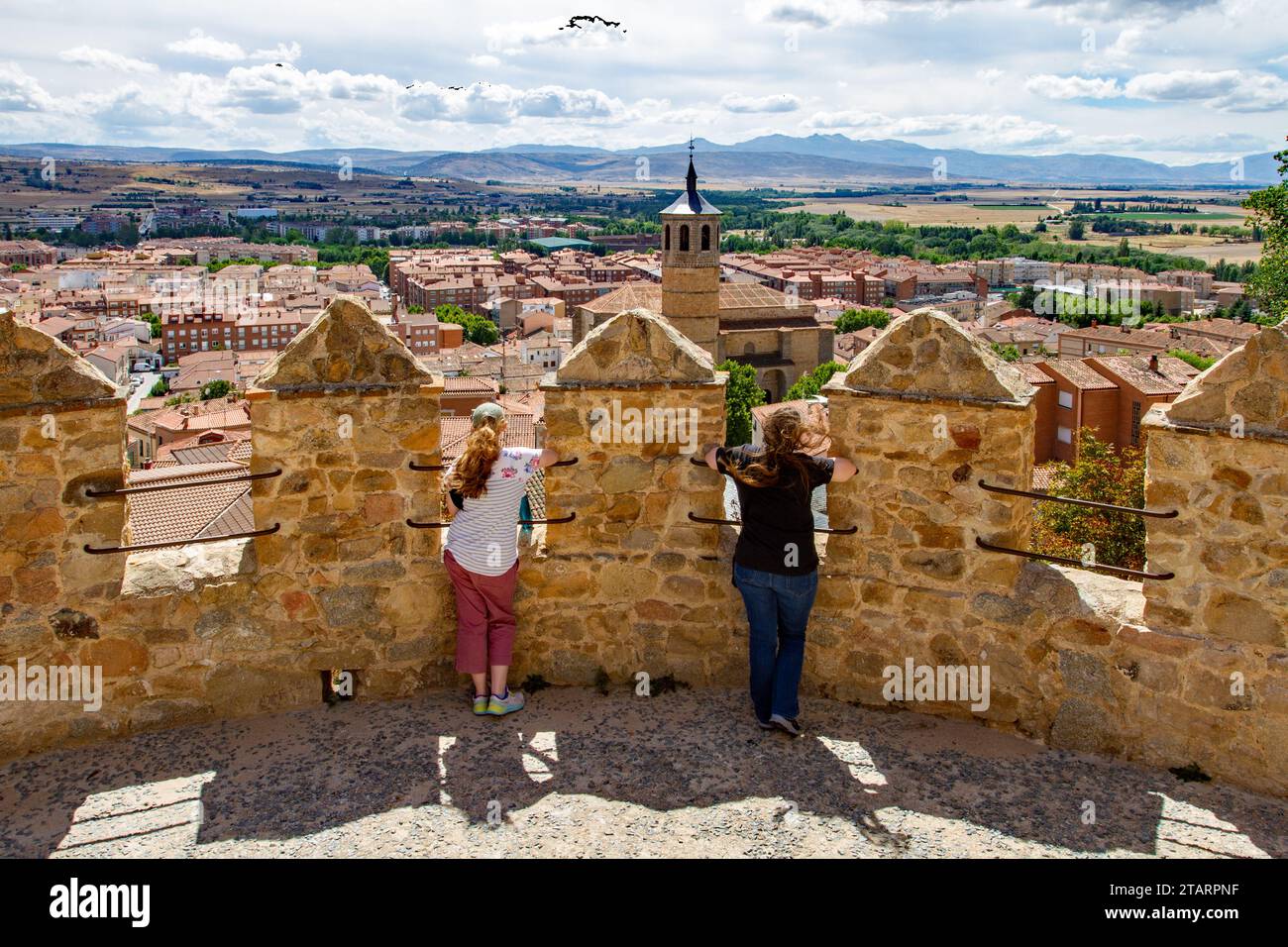People on the ramparts of the fortified city walls in the Spanish ...
