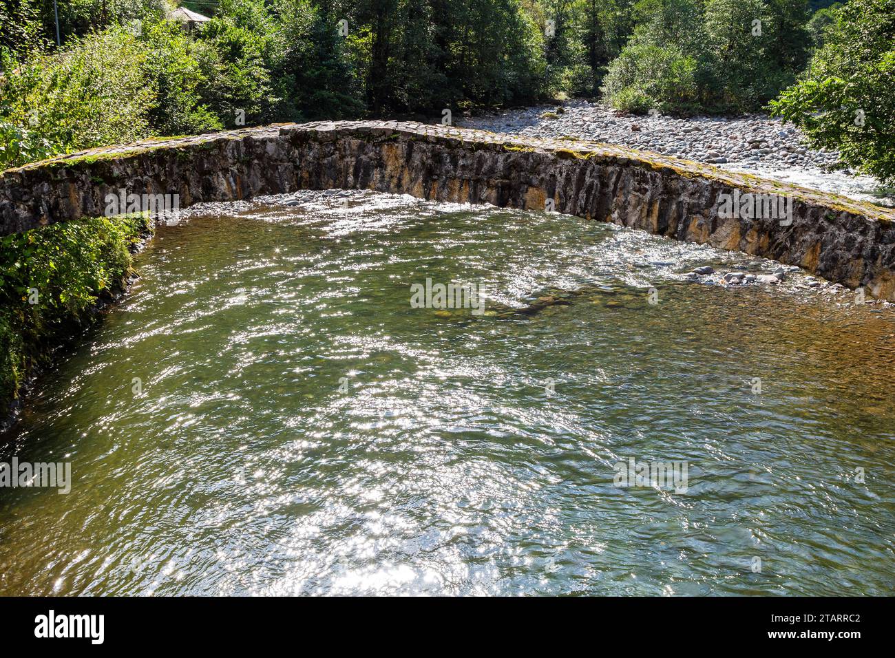 travel to Georgia - view of Tskhemlara stone arch bridge (bridge of ...