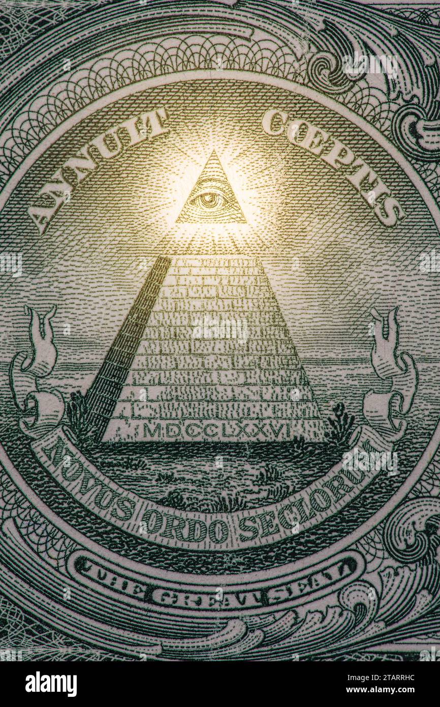 Close up of a small section of a one dollar bill showing the all seeing ...