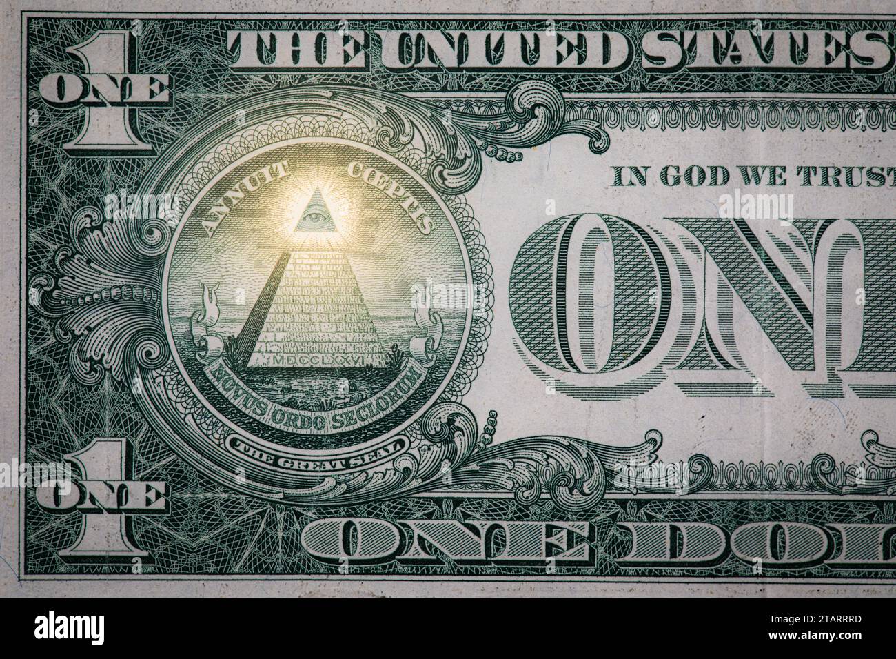 Close up of a small section of a one dollar bill showing the all seeing ...