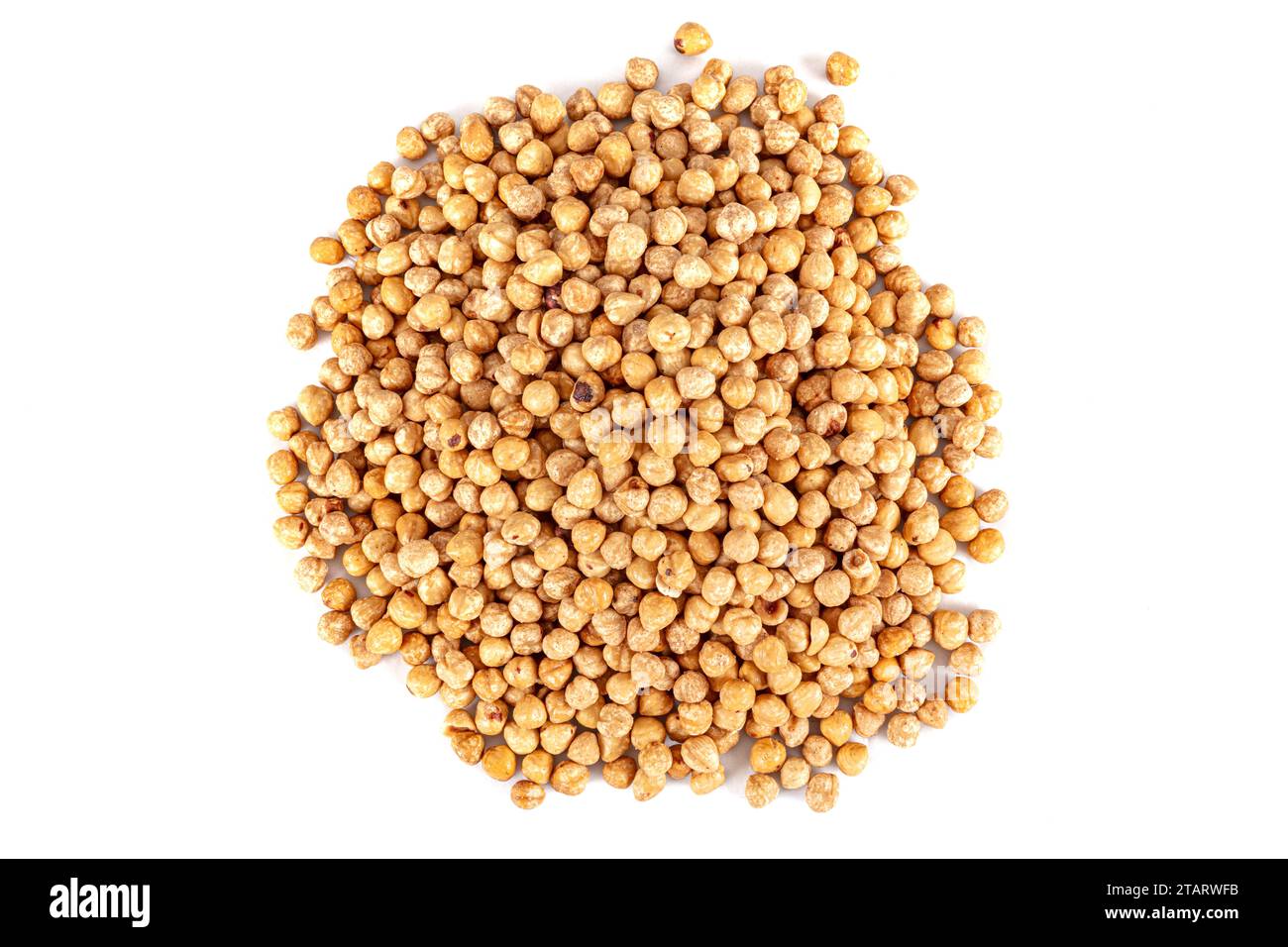 Pile of roasted nuts on white background. Hazelnuts harvest. Filbert ...