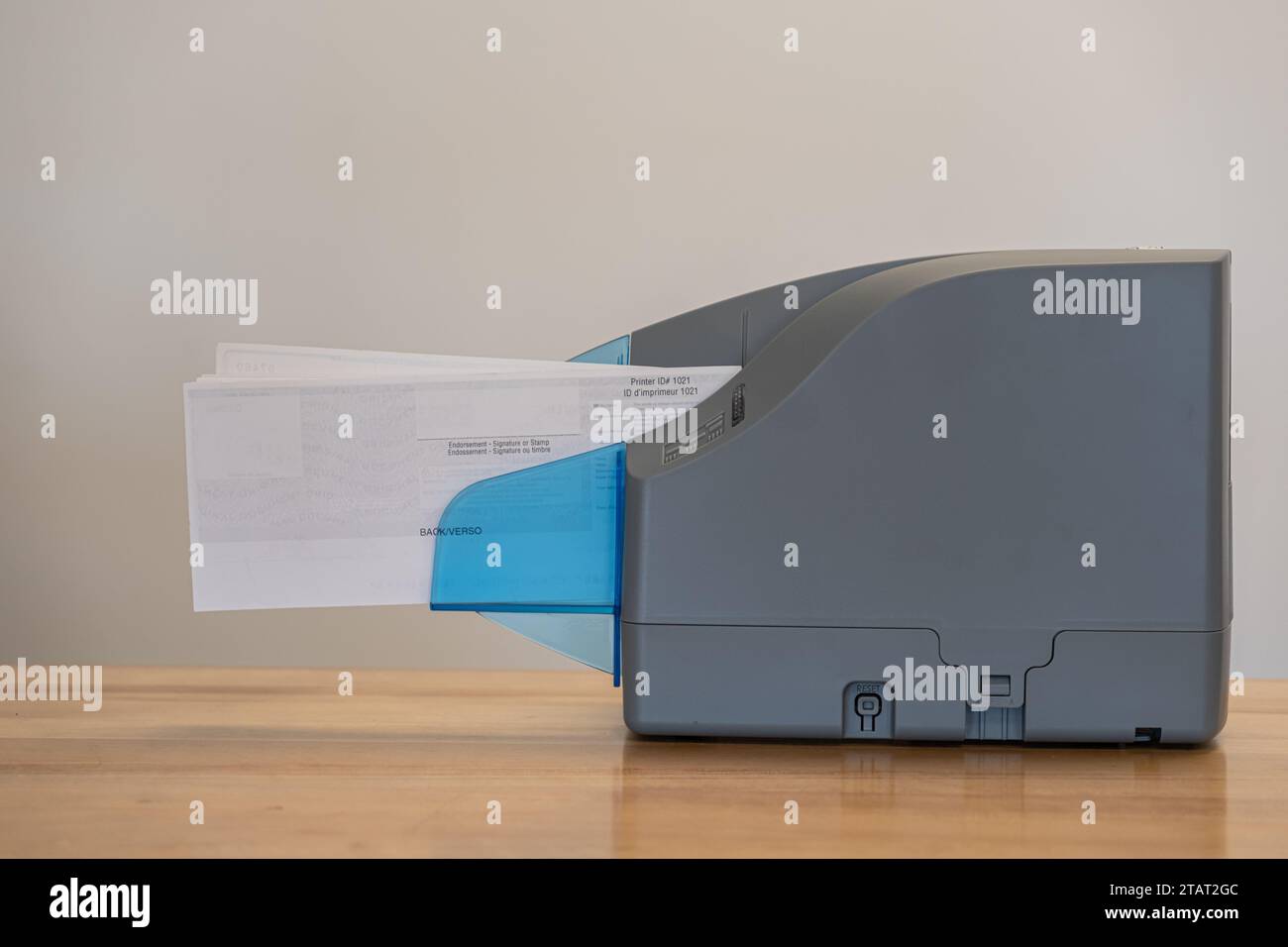 Bank Cheque scanner used to deposit cheques remotely Stock Photo - Alamy