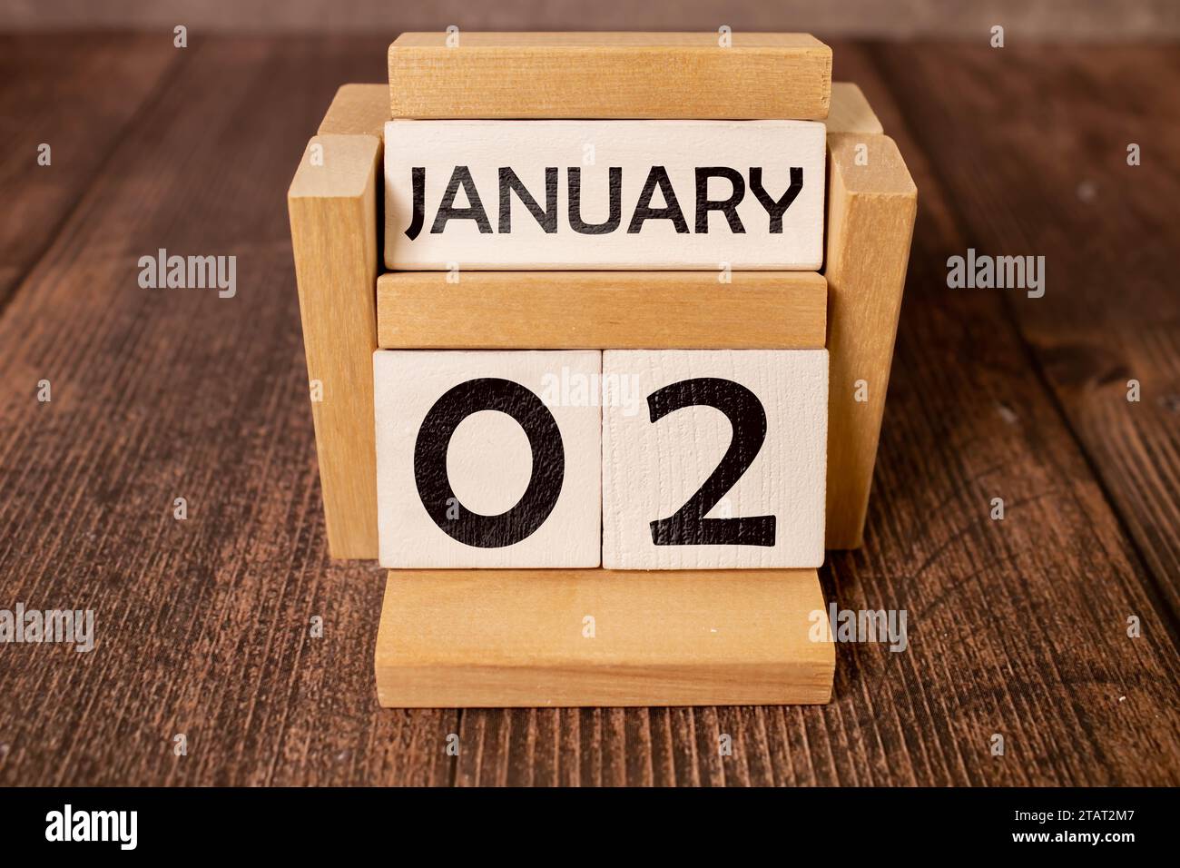 January 2nd.January 2 white wooden calendar on wood background ...