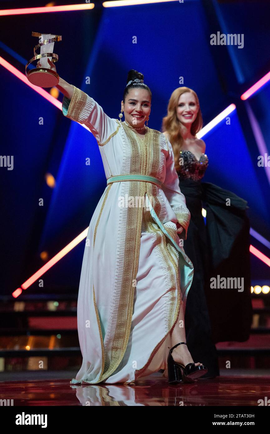Marrakech, Morocco. 02nd Dec, 2023. Director Asmae El Moudir arrives on stage as she receives ...