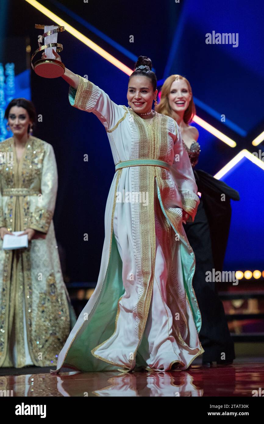 Marrakech, Morocco. 02nd Dec, 2023. Director Asmae El Moudir arrives on stage as she receives ...