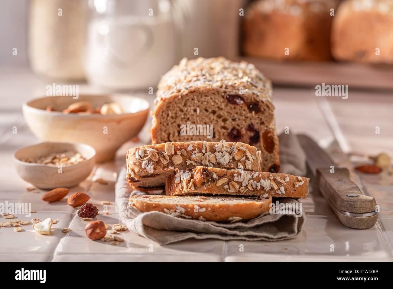 Healthy delicacies bread with bran, raisins and nuts. Bread with ...