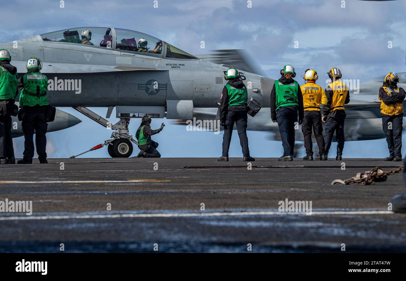 PACIFIC OCEAN (Nov. 27, 2023) U.S. Sailors prepare to launch an E-18G ...