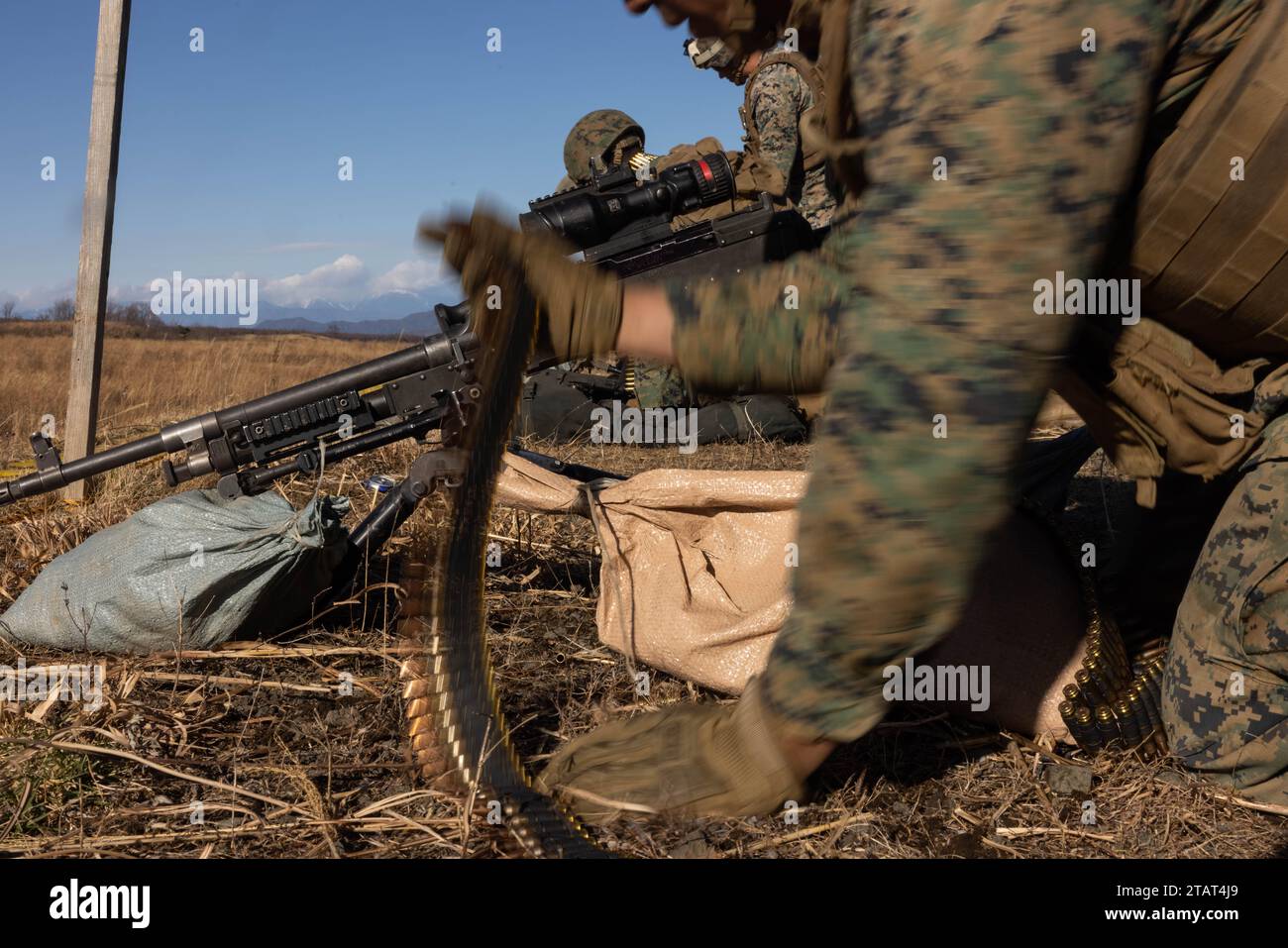 U.S. Marine Corps Lance Cpl. Jovanni Belloflores prepares to load an ...