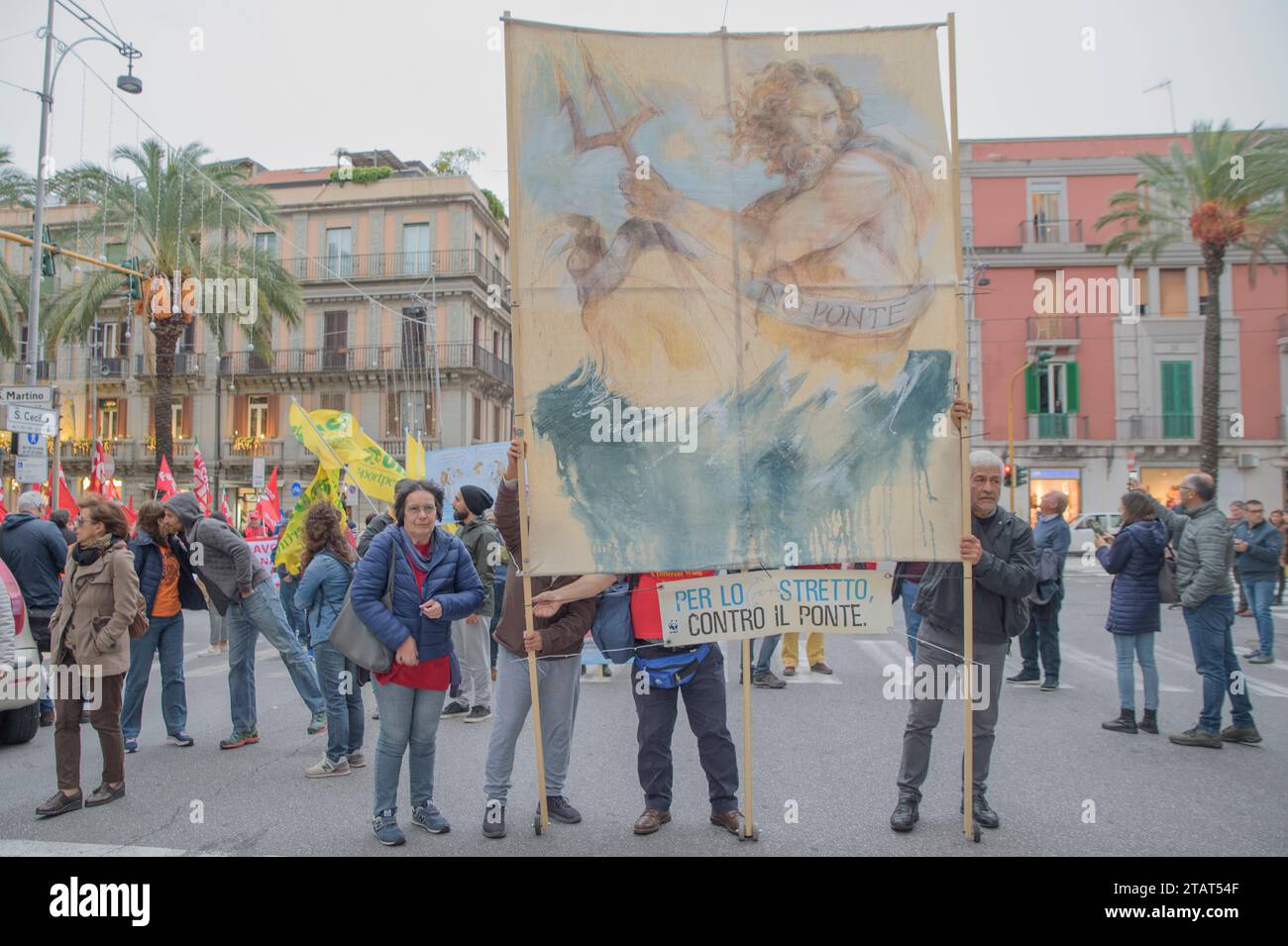 Messina, Italy. 2nd Dec, 2023. Demonstrators carry a large sign ...