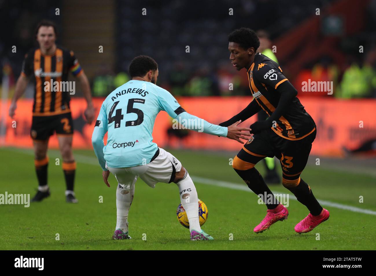 Jaden Philogene-Bidace of Hull City in action with Watford's Ryan ...