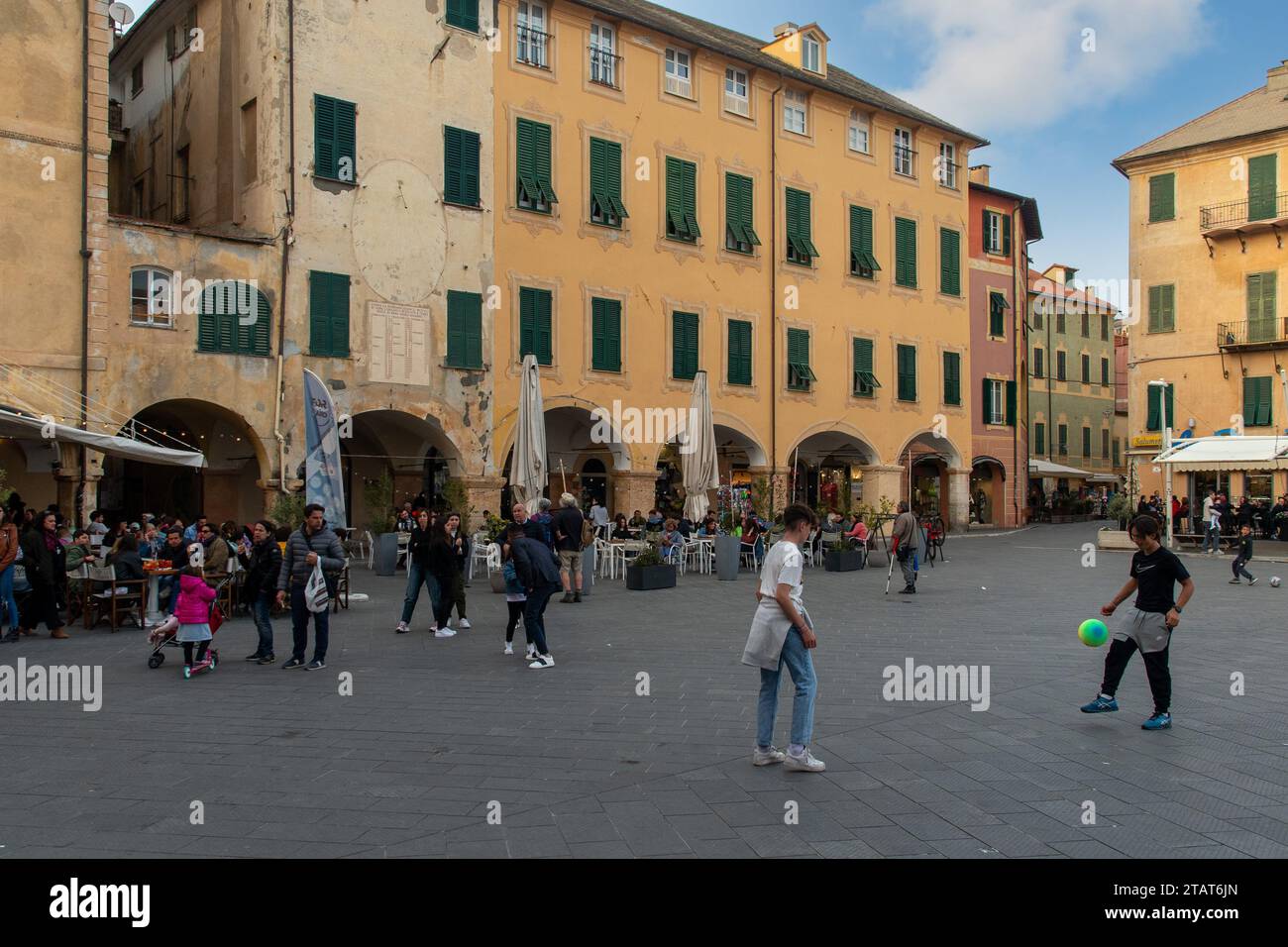 Children playing soccer in Piazza Vittorio Emanuele II, the main square ...