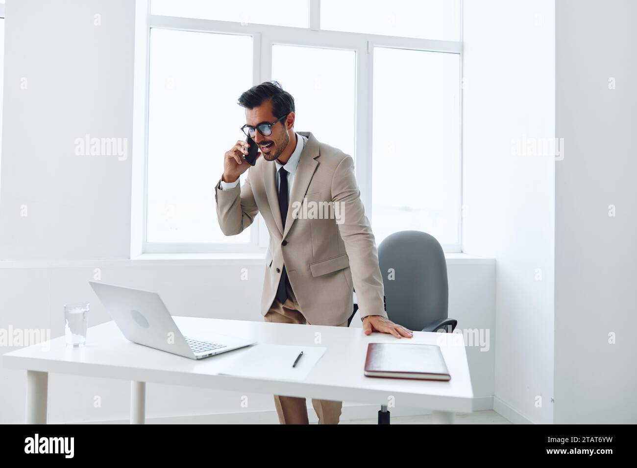 Man video call office businessman smile happy talk phone winner ...